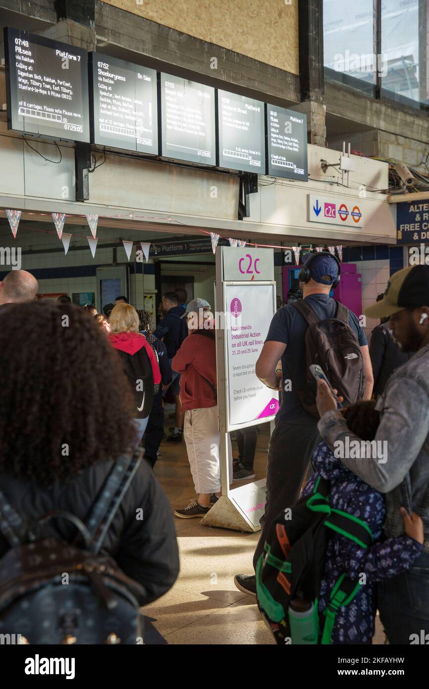 Passengers wait at Barking Station in East London in the morning as the ...