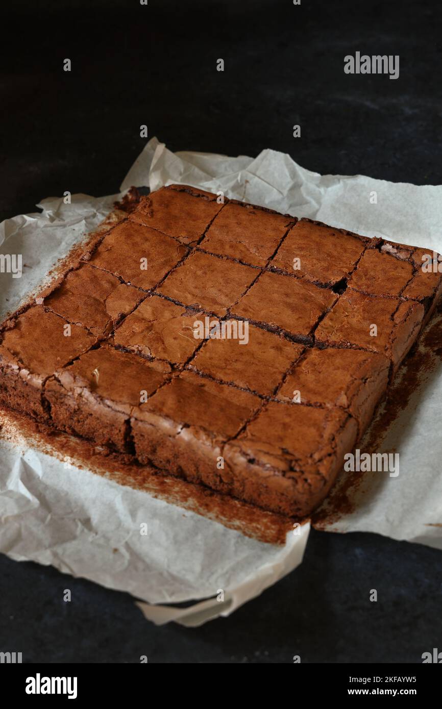 Home baked rich indulgent chocolate brownies fresh from the oven with ...
