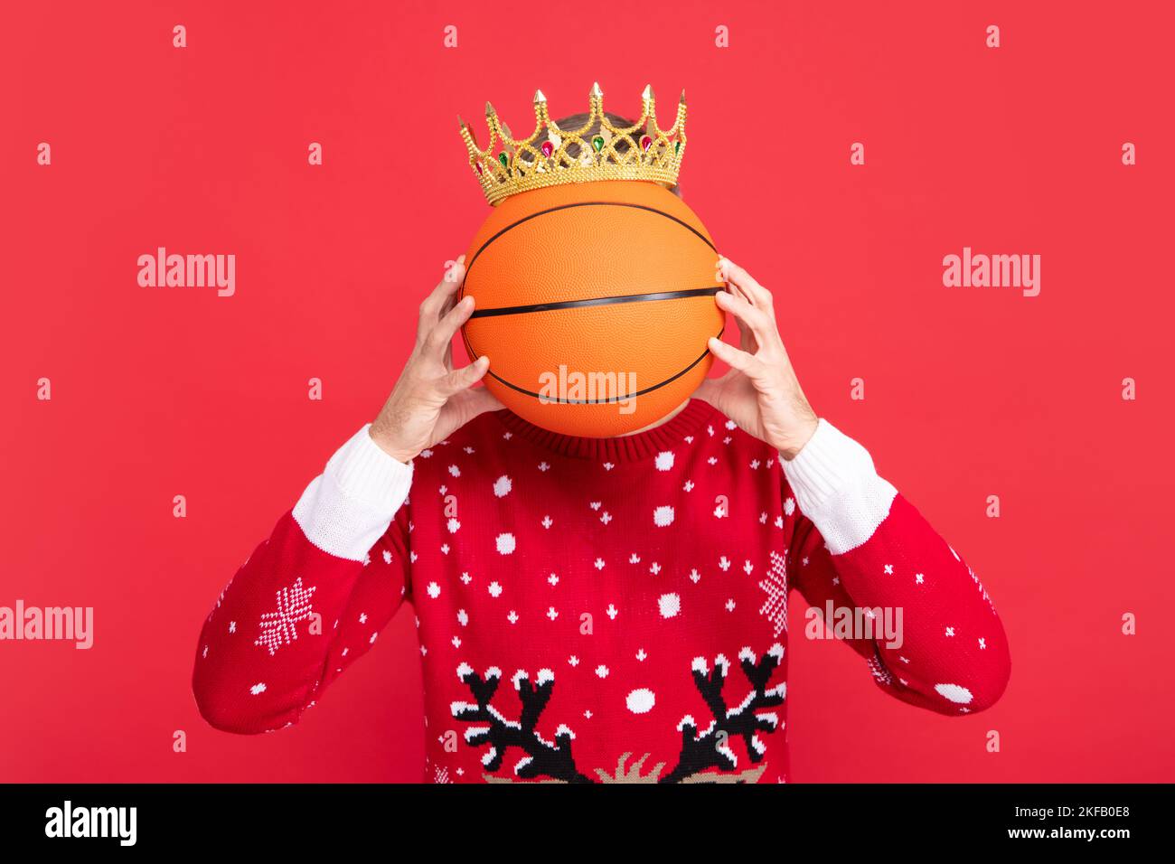 Winter man in crown hold basketball ball. Portrait of christmas santa ...