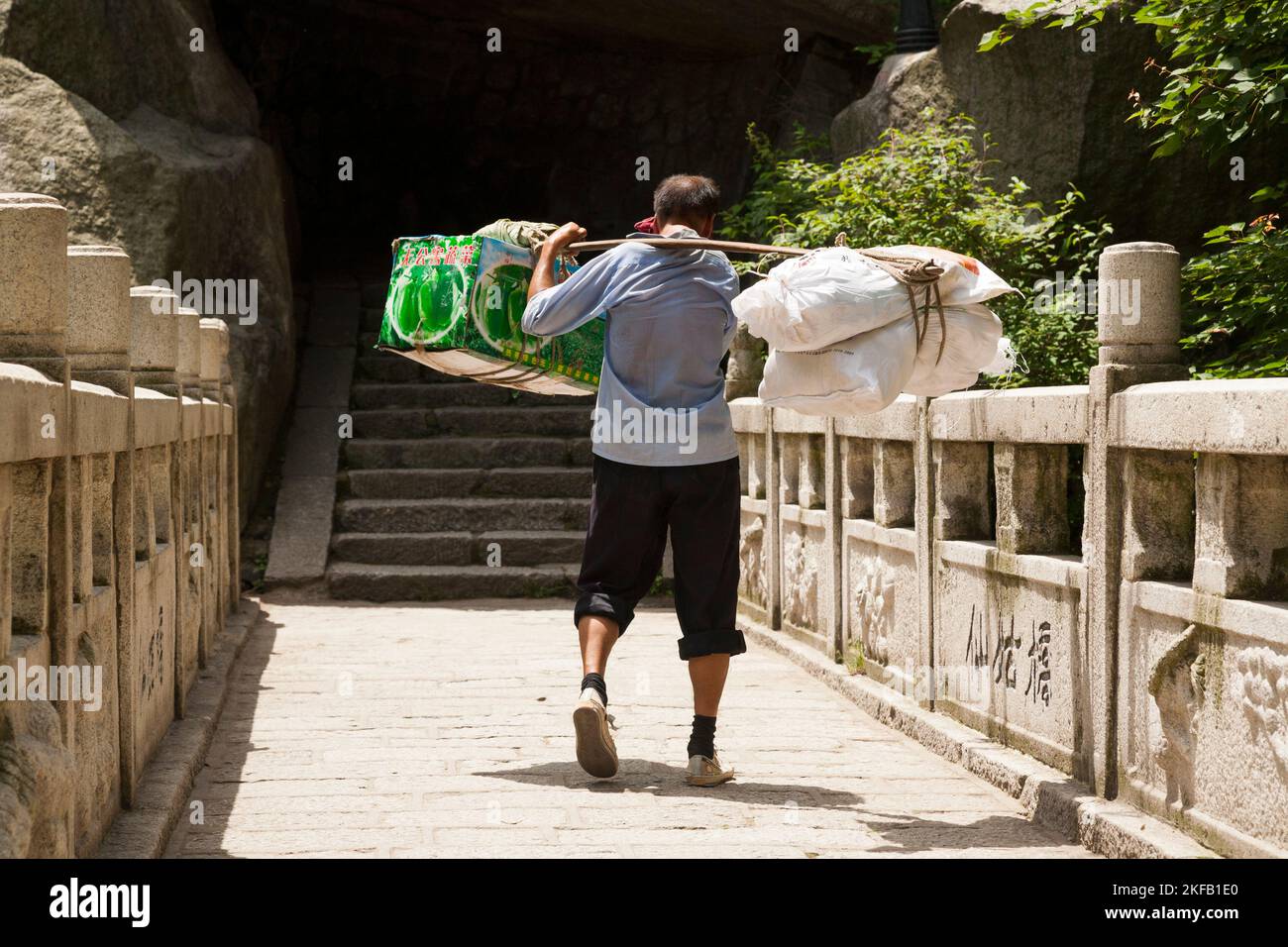 Carry heavy load shoulders hi-res stock photography and images - Alamy