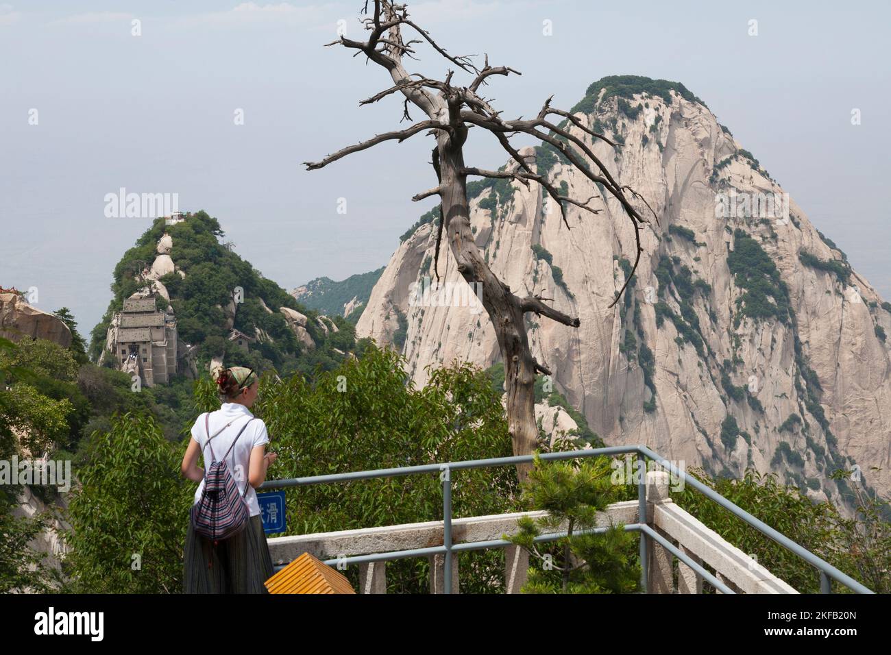 Western woman tourist Caucasian visitor and view landscape seen from viewing platform along the ...