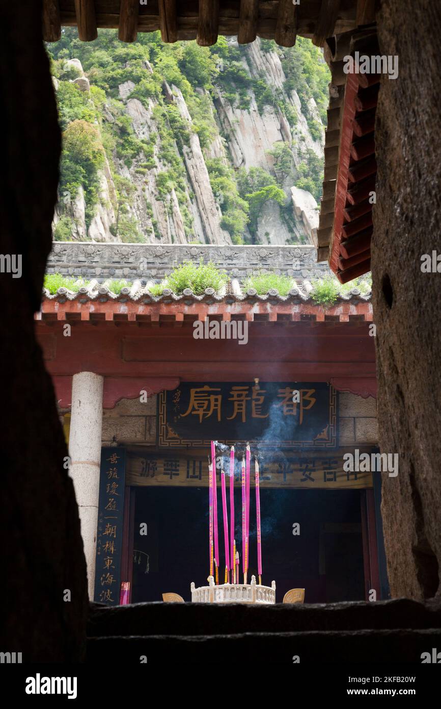 Altar shrine with Taoist imagery in a temple building encountered when ...