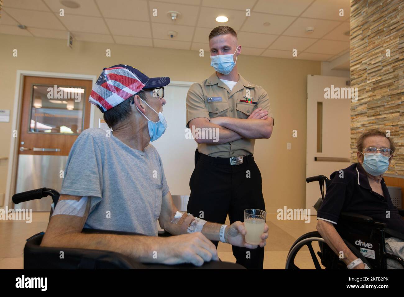 Fire Controlman 2nd Class Tyler Westbrook, center, from Port Huron ...