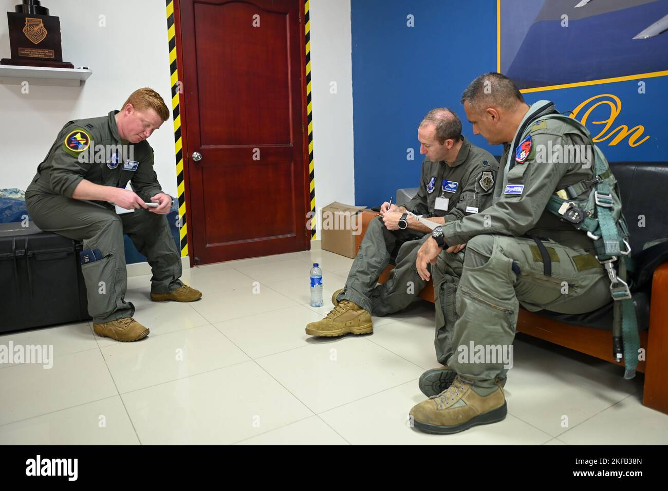 U.S. Air Force Lt. Col. Taylor Blevins, center, a pilot with the South ...