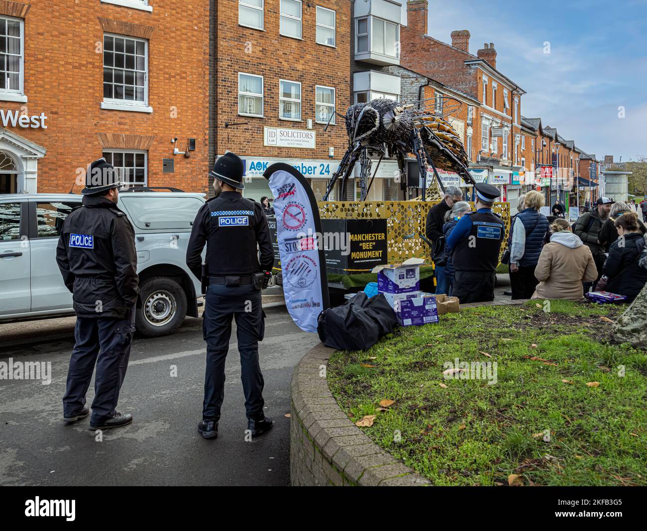A giant bee, made from knives and guns which were seized or handed over ...