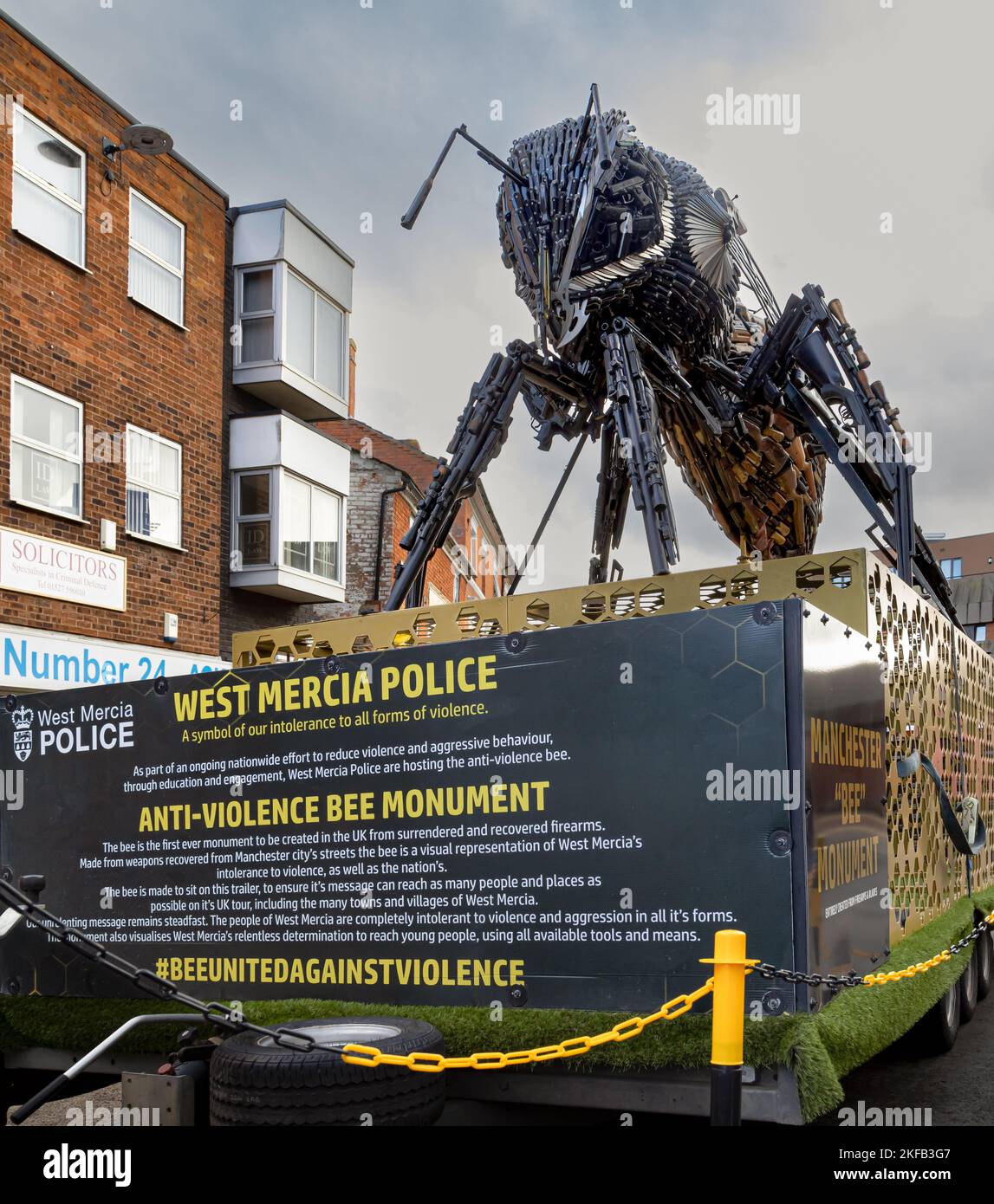 A giant bee, made from knives and guns which were seized or handed over ...