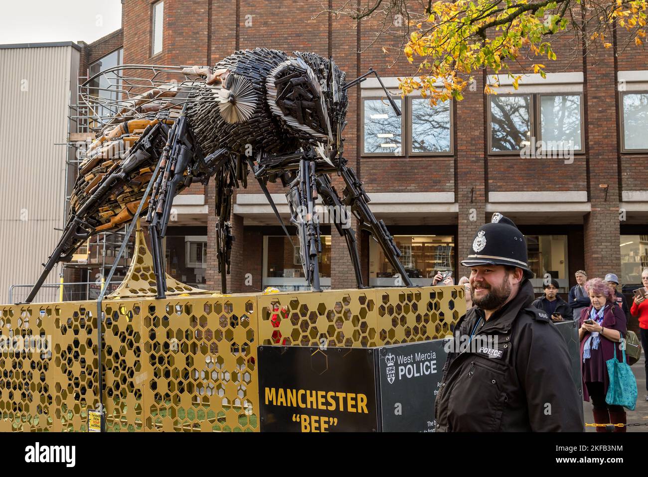 A giant bee, made from knives and guns which were seized or handed over ...