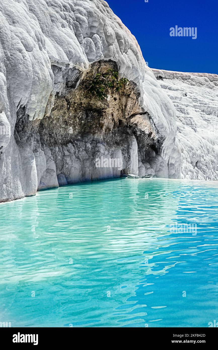 View of natural travertine pools and terraces in Pamukkale. Cotton ...