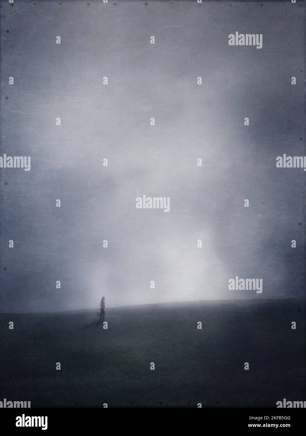 lone figure walking in the fog Stock Photo - Alamy