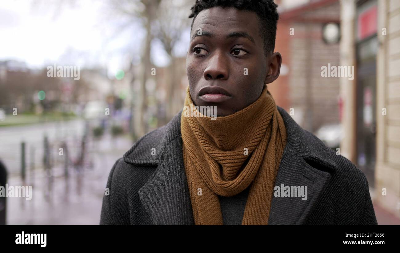 Elegant black african man walking in european downtown Stock Photo - Alamy