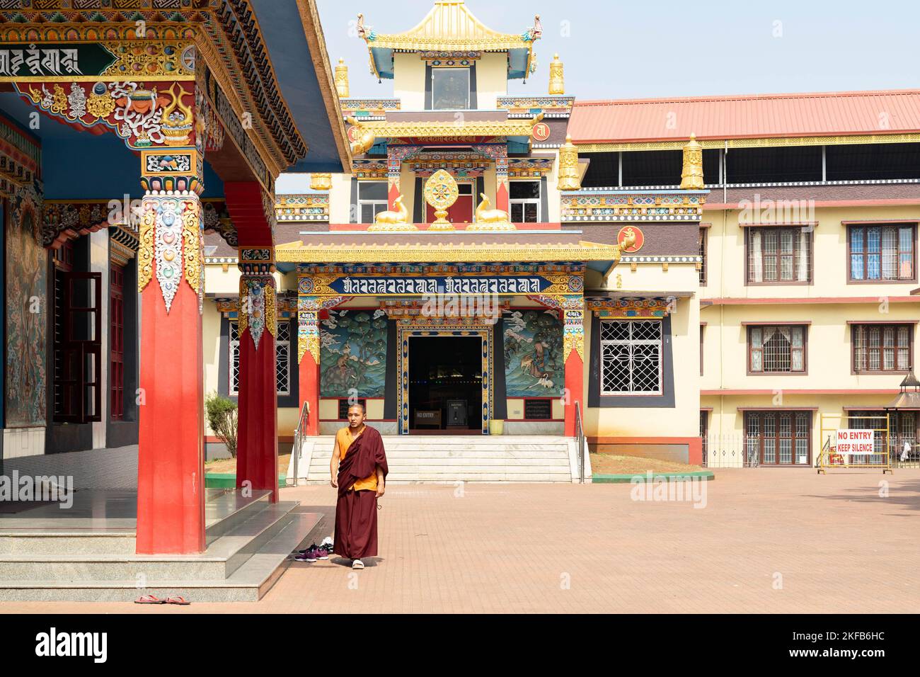 A Buddhist monk seen at the Namdroling Monastery Temple. His Holiness ...