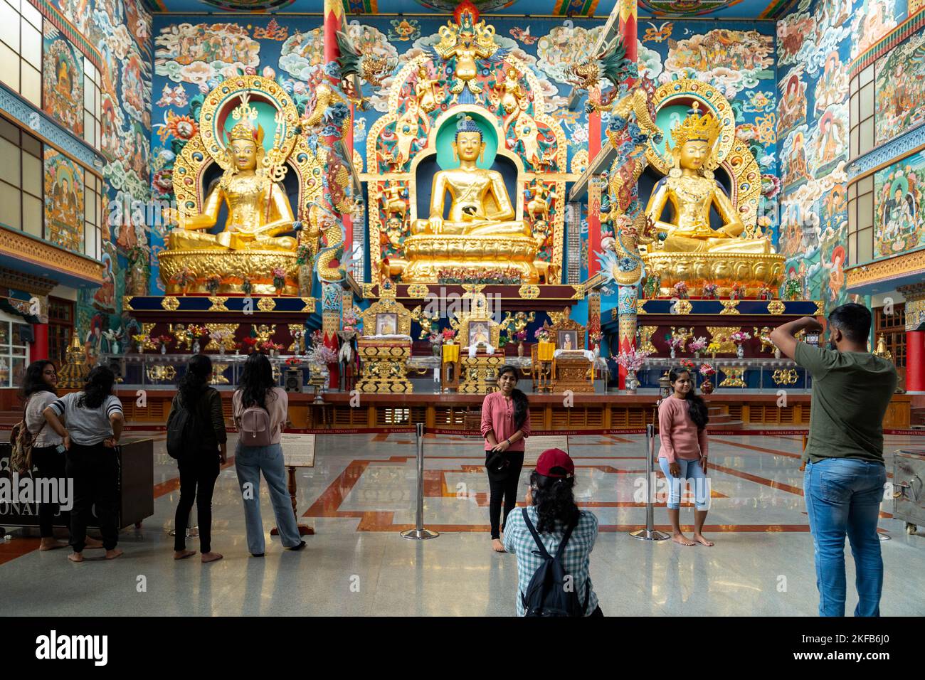 Visitors take photos inside the Temple. His Holiness the 3rd Drubwang ...
