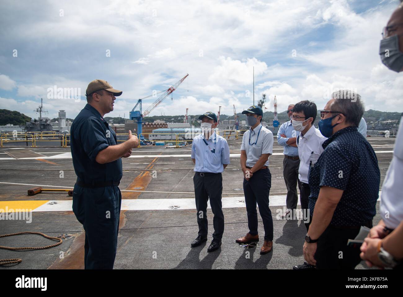 220901-N-WU964-1071 YOKOSUKA, Japan (Sep. 1, 2022) Members of the ...