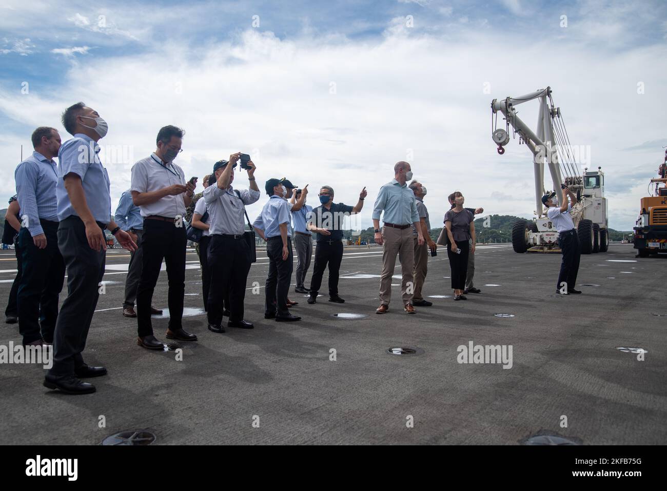220901-N-WU964-1028 YOKOSUKA, Japan (Sep. 1, 2022) Members of the ...