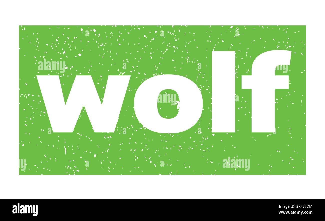 wolf text written on green grungy stamp sign Stock Photo - Alamy