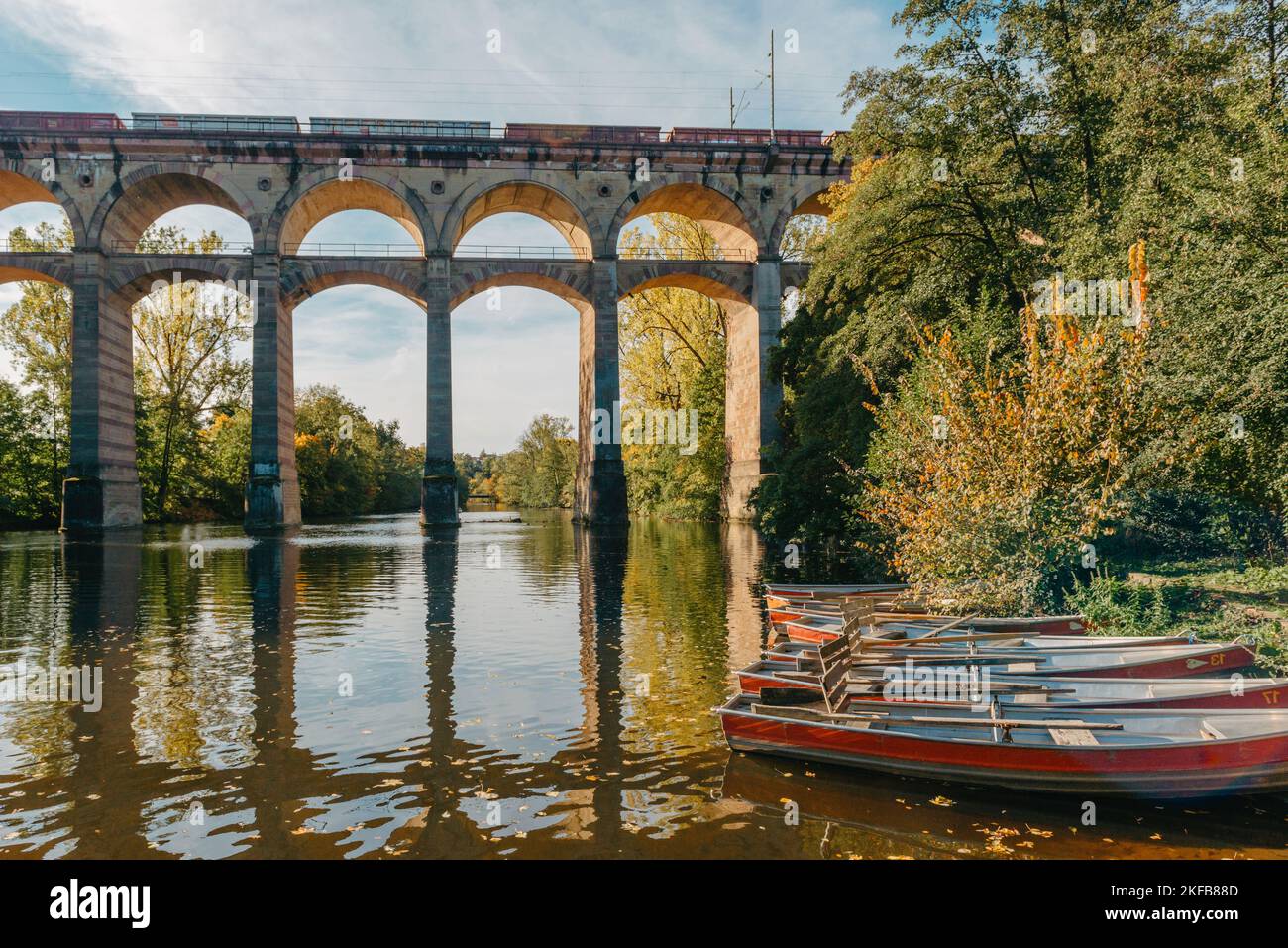 Germany train passing train bridge on cloudy day in germany hi-res ...
