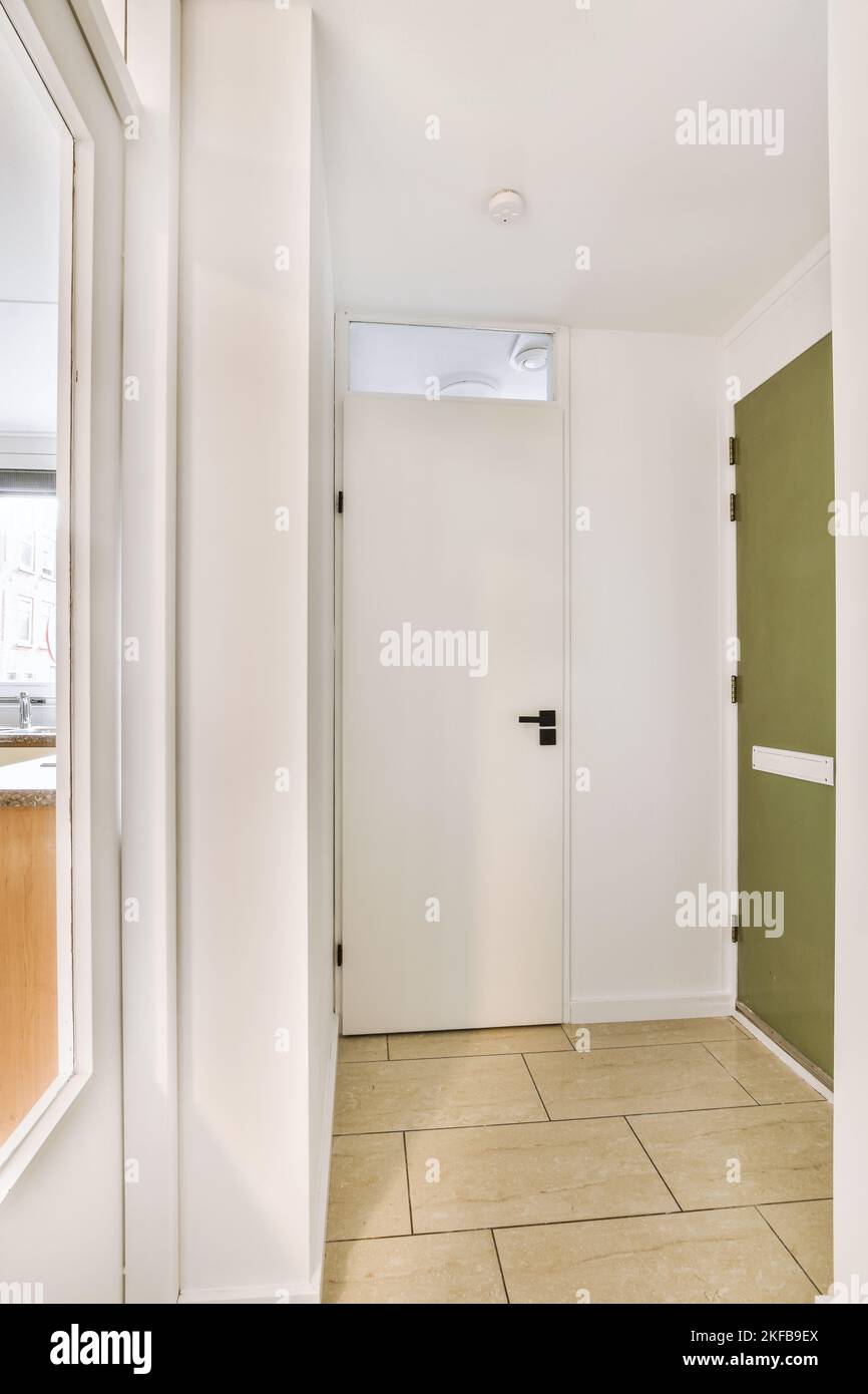 Interior of modern flat in minimal style with narrow empty corridor ...