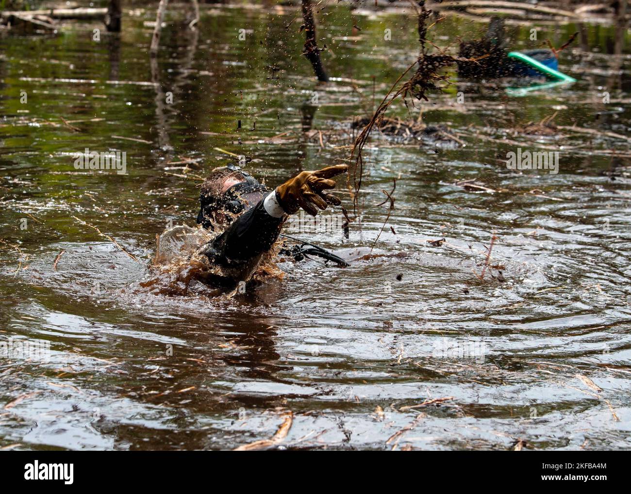 U.S. Coast Guard DV2 David Blincoe, a Coast Guard diver assigned to the ...
