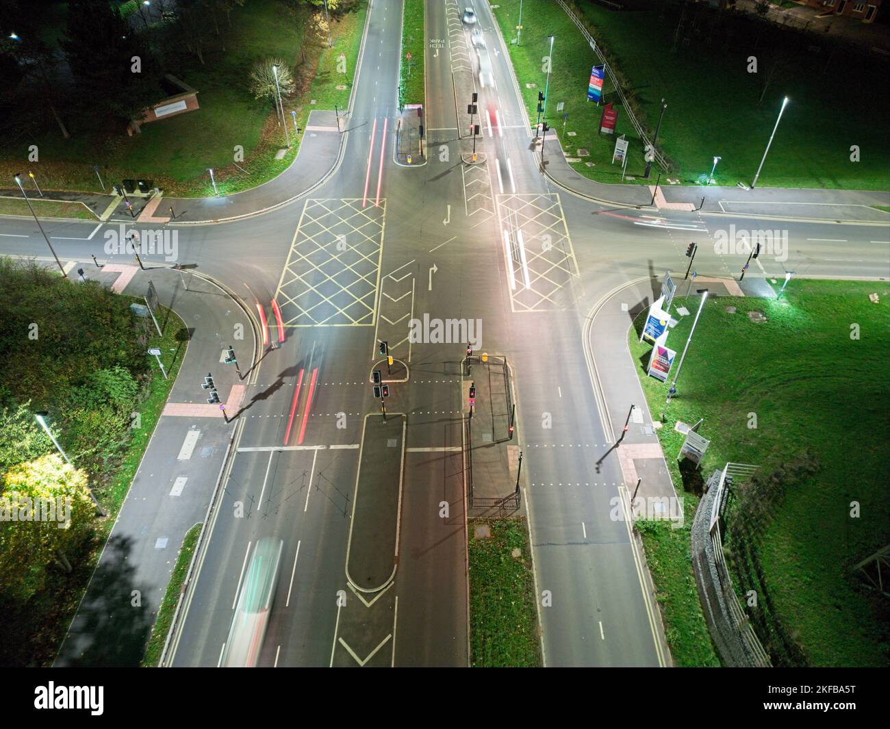 An aerial view of traffic on a glowing road at night Stock Photo - Alamy
