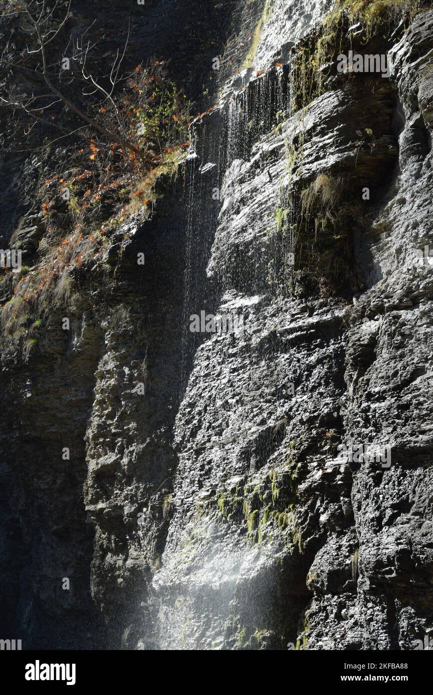 A vertical view of water dripping from mesmerizing rocks at Mine Kill ...