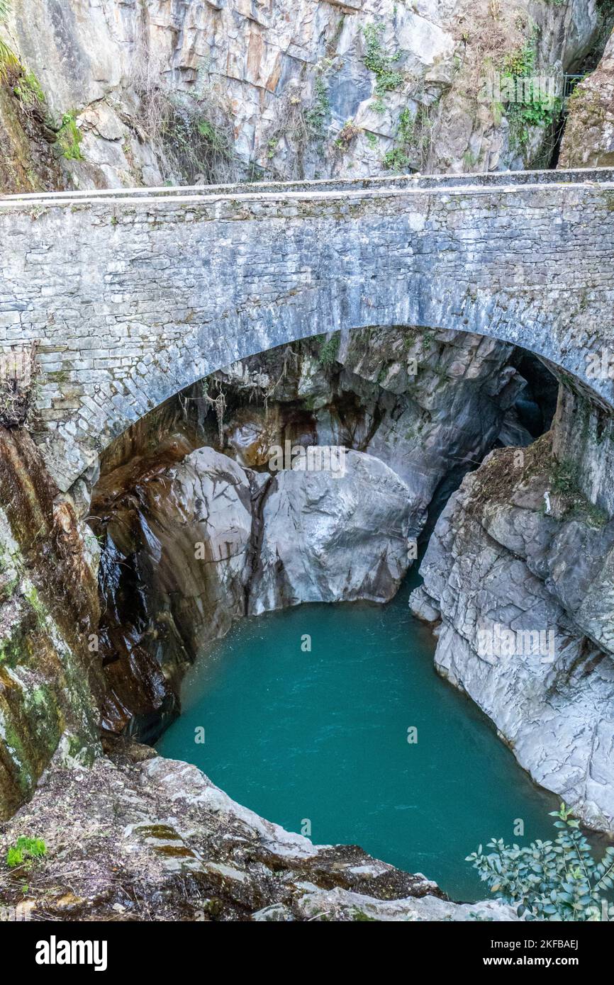 The stone bridge over the Bellano ravine Stock Photo - Alamy