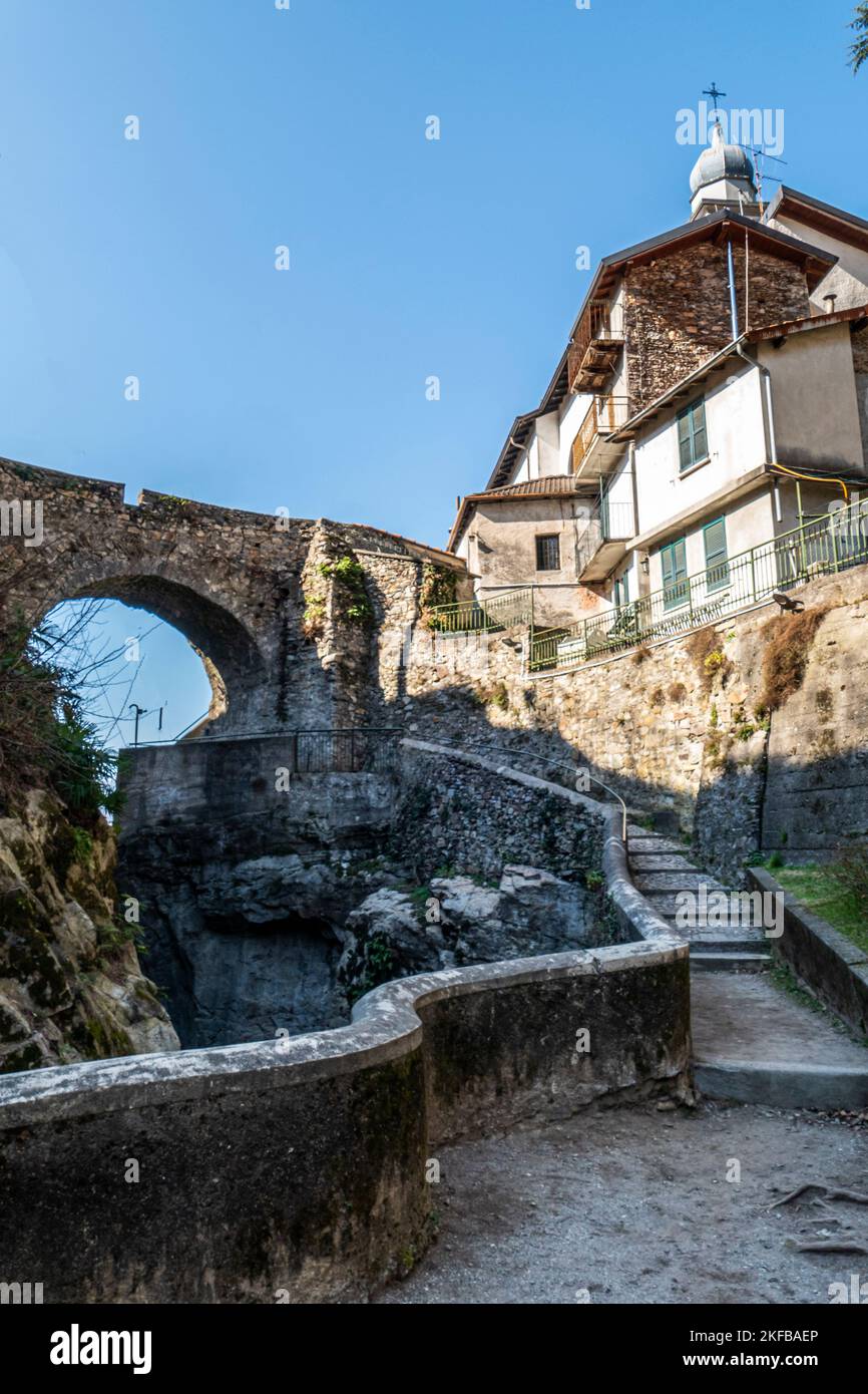The stone bridge over the Bellano ravine Stock Photo - Alamy