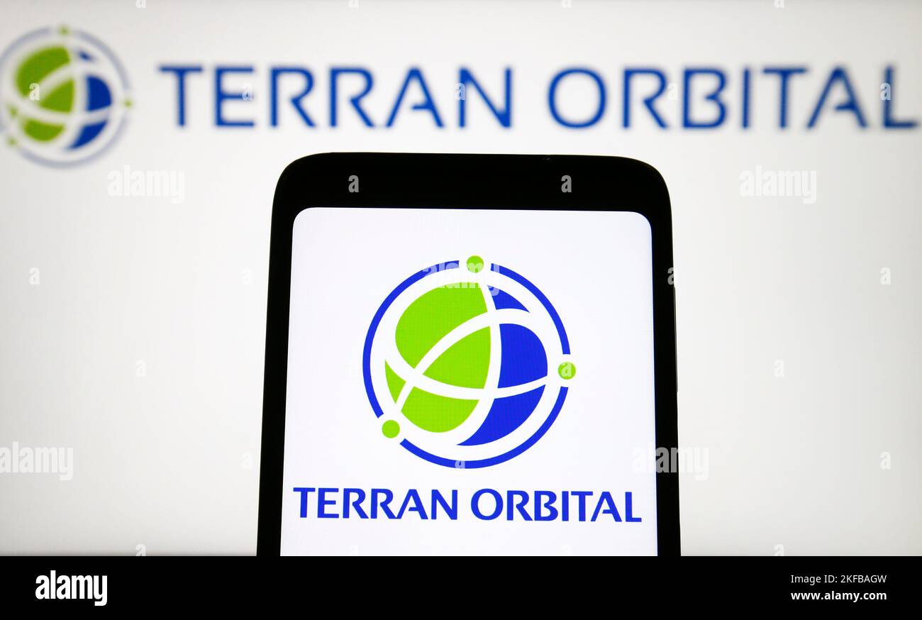 In this photo illustration, Terran Orbital logo is seen on a smartphone ...