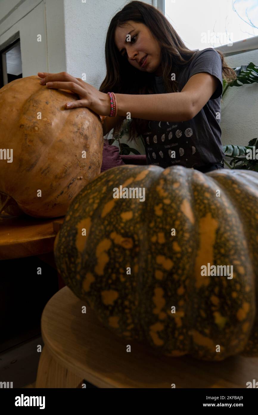 Carved Halloween pumpkin, jack lantern, with carving tools. Spooky ...