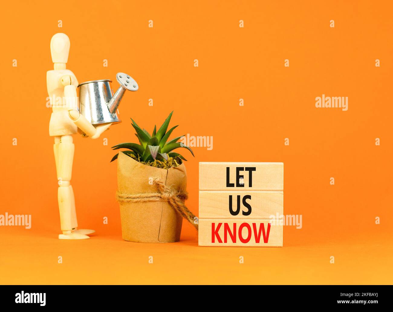 Let us know symbol. Concept words Let us know on wooden blocks on a ...
