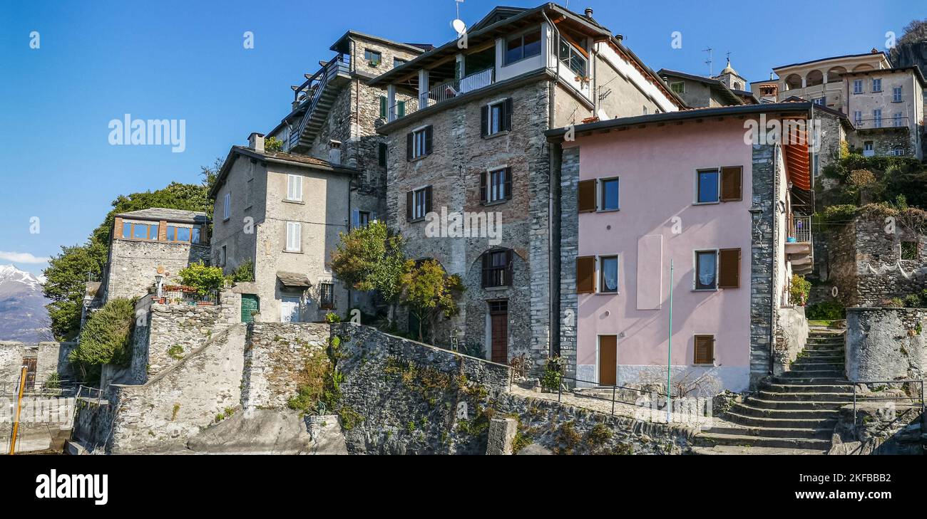 Stone houses in the small village of Corenno Stock Photo - Alamy