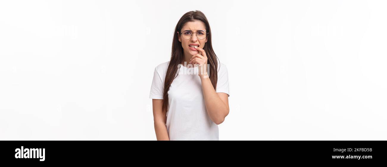 Waist-up portrait of embarrassed young cute girl feel nervous ...