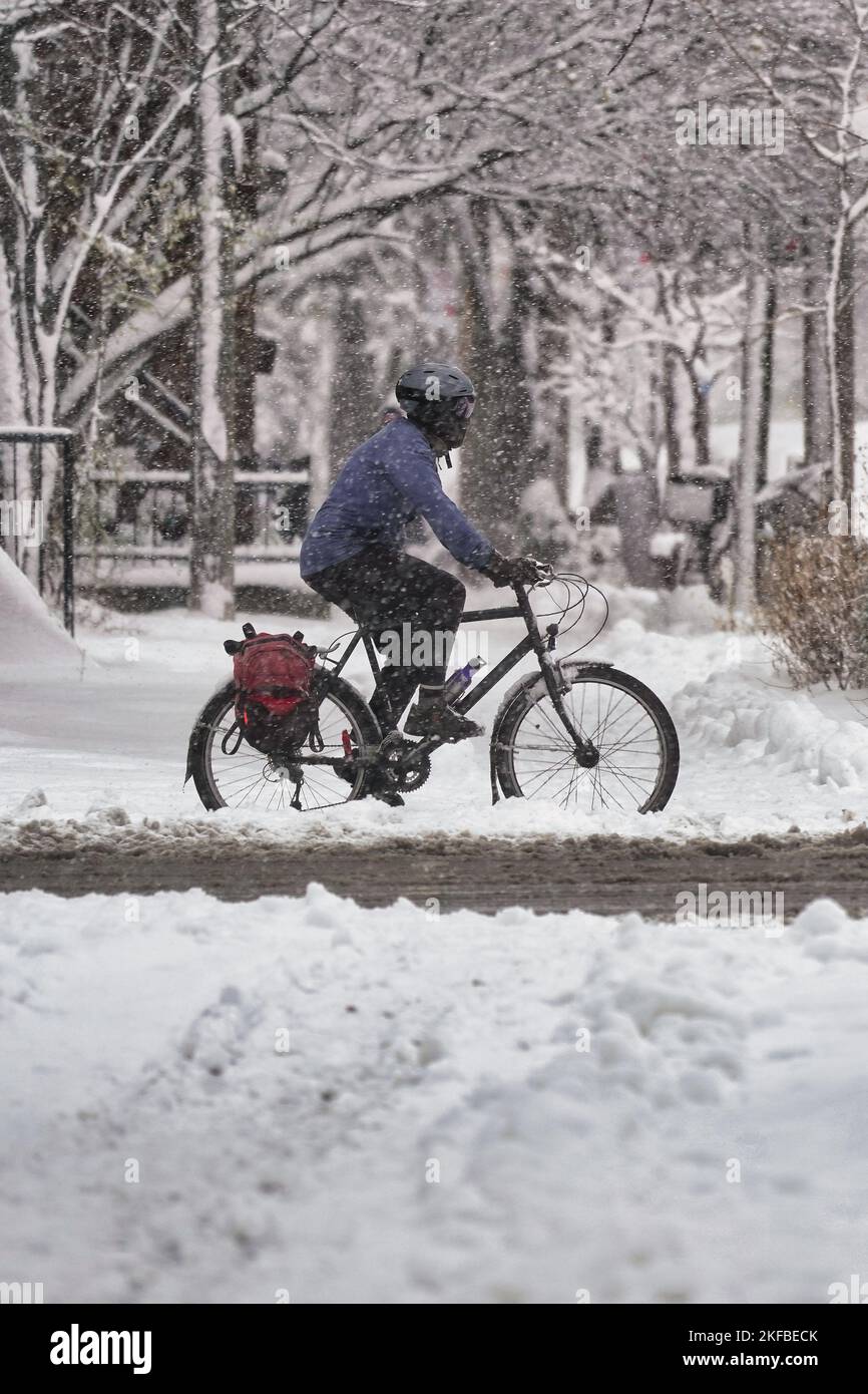 Bicycle on city streets in winter Stock Photo - Alamy