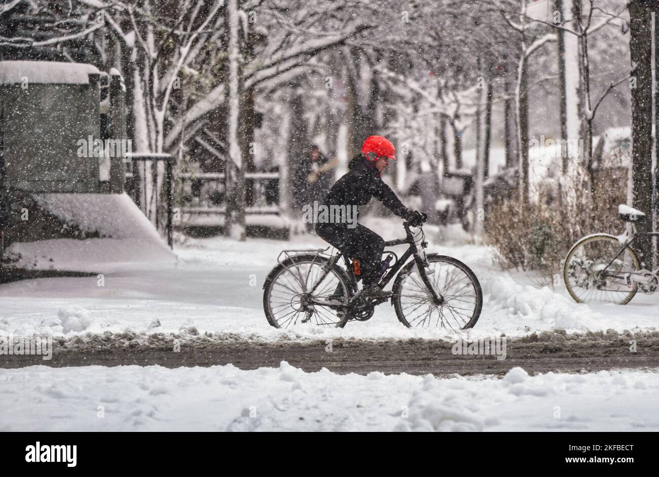 Bicycle on city streets in winter Stock Photo - Alamy