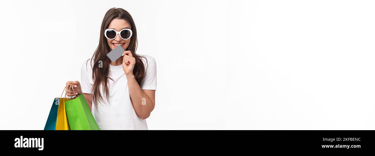 Shopping, leisure and lifestyle concept. Portrait of excited beautiful ...