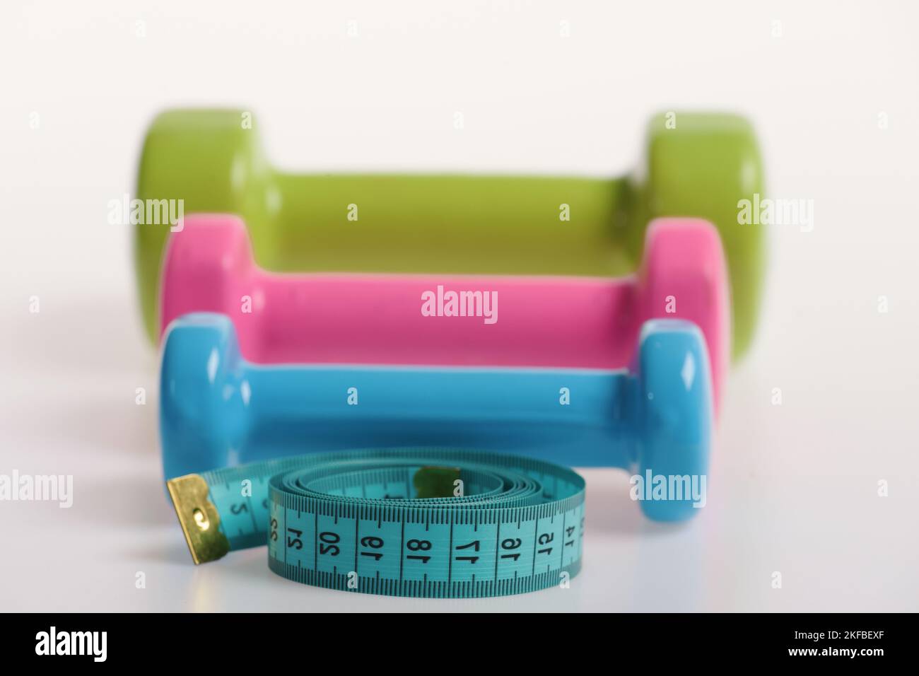 Health regime and fitness symbols. Barbells in small size Stock Photo ...