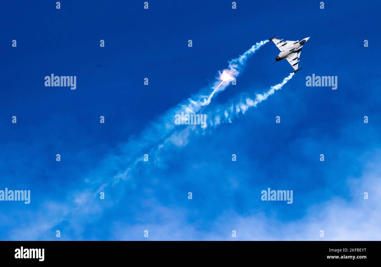 A Hungarian Air Force JAS-39 Gripen aircraft deploys a flare during an ...