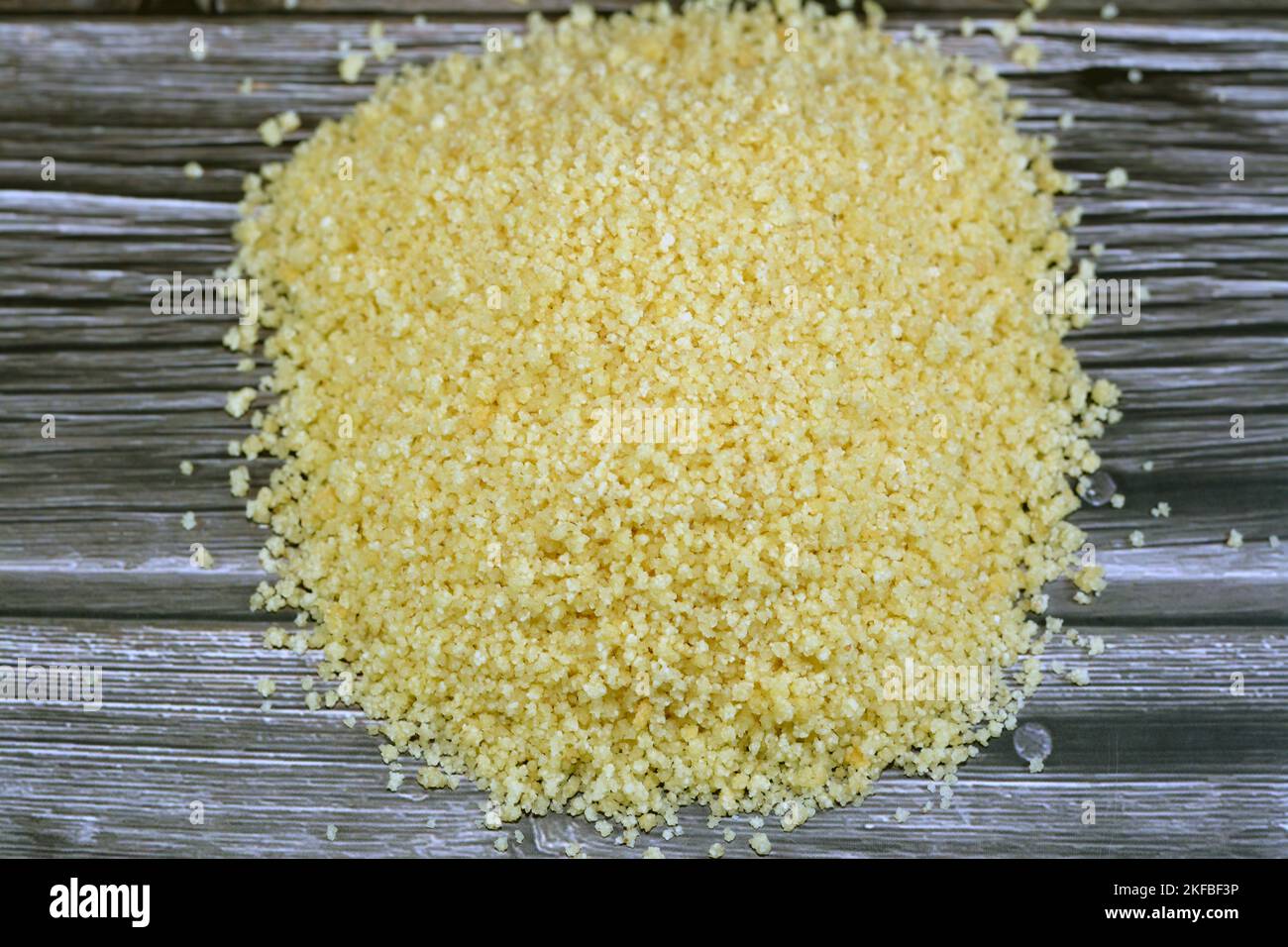 Arabian Cuisine dish of small steamed granules of rolled durum wheat ...