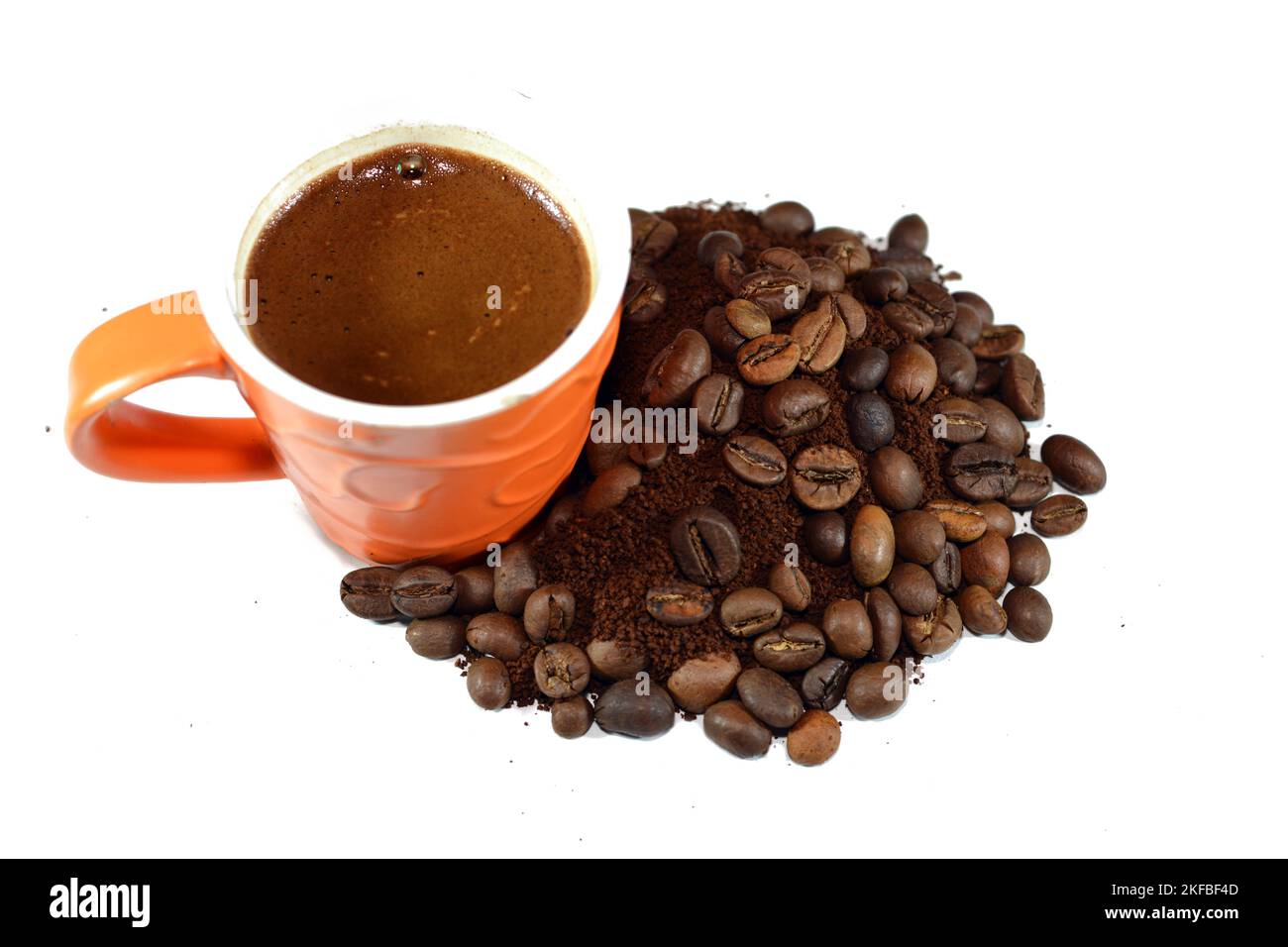 A cup of Turkish coffee with coffee beans, seeds of the Coffea plant ...