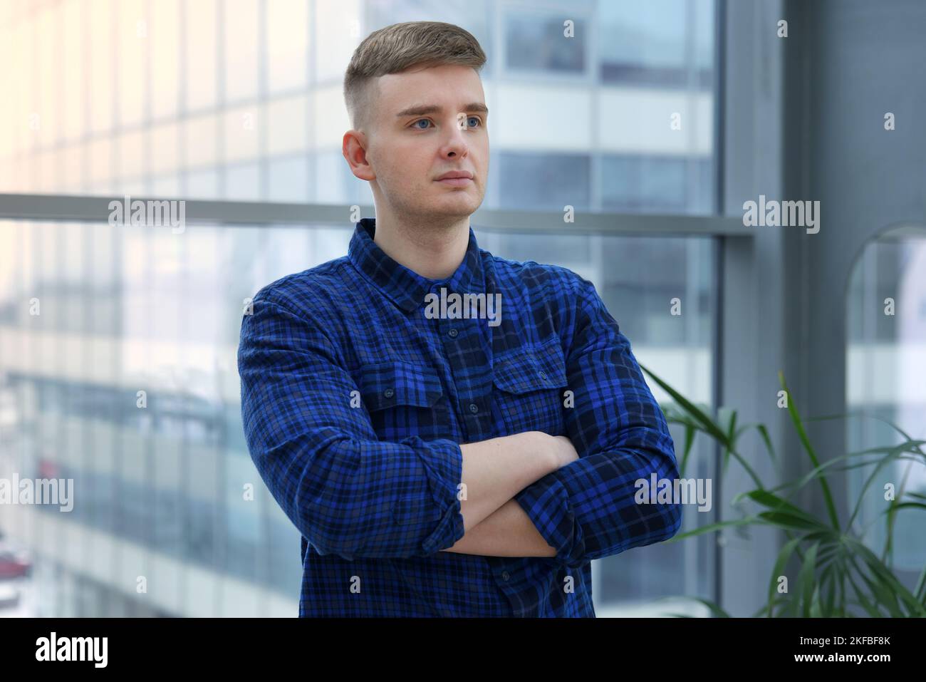 Serious business man folding hands hi-res stock photography and images ...