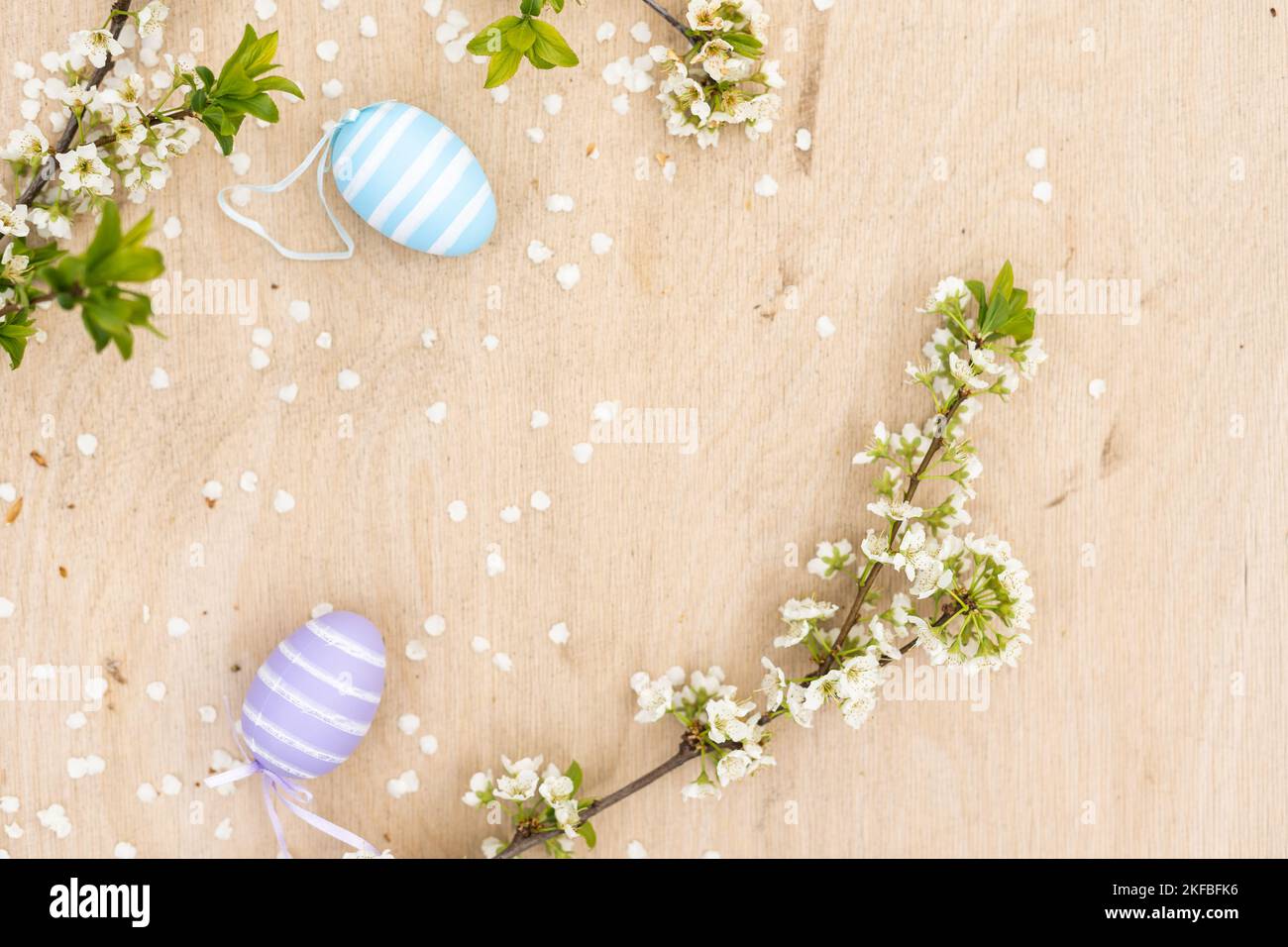 A Easter egg on a branch of a blooming cherry tree. Easter spring ...