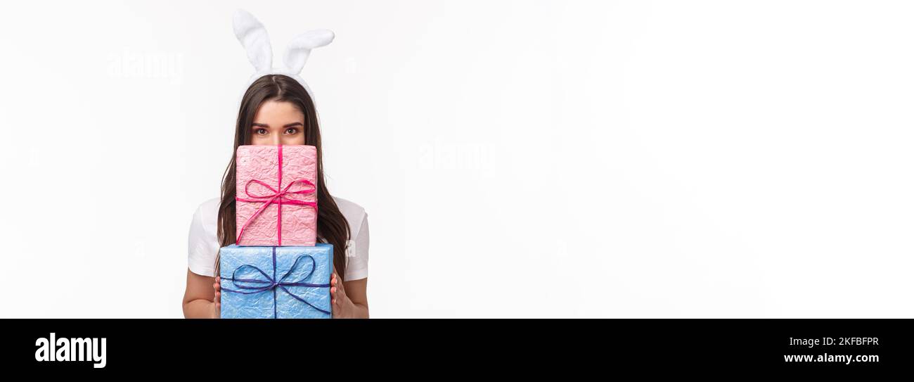 Celebration, holidays and presents concept. Portrait of happy and cute ...