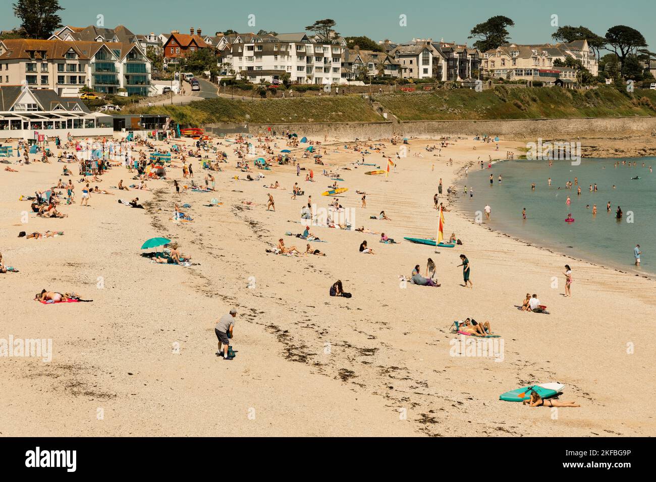 An aerial shot of the Falmouth Beach in the UK with Tourists Enjoying ...