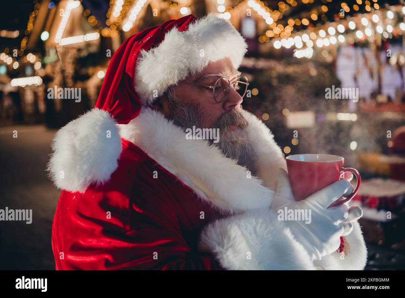 Photo of calm person saint nicholas santa claus relax outside midnight ...