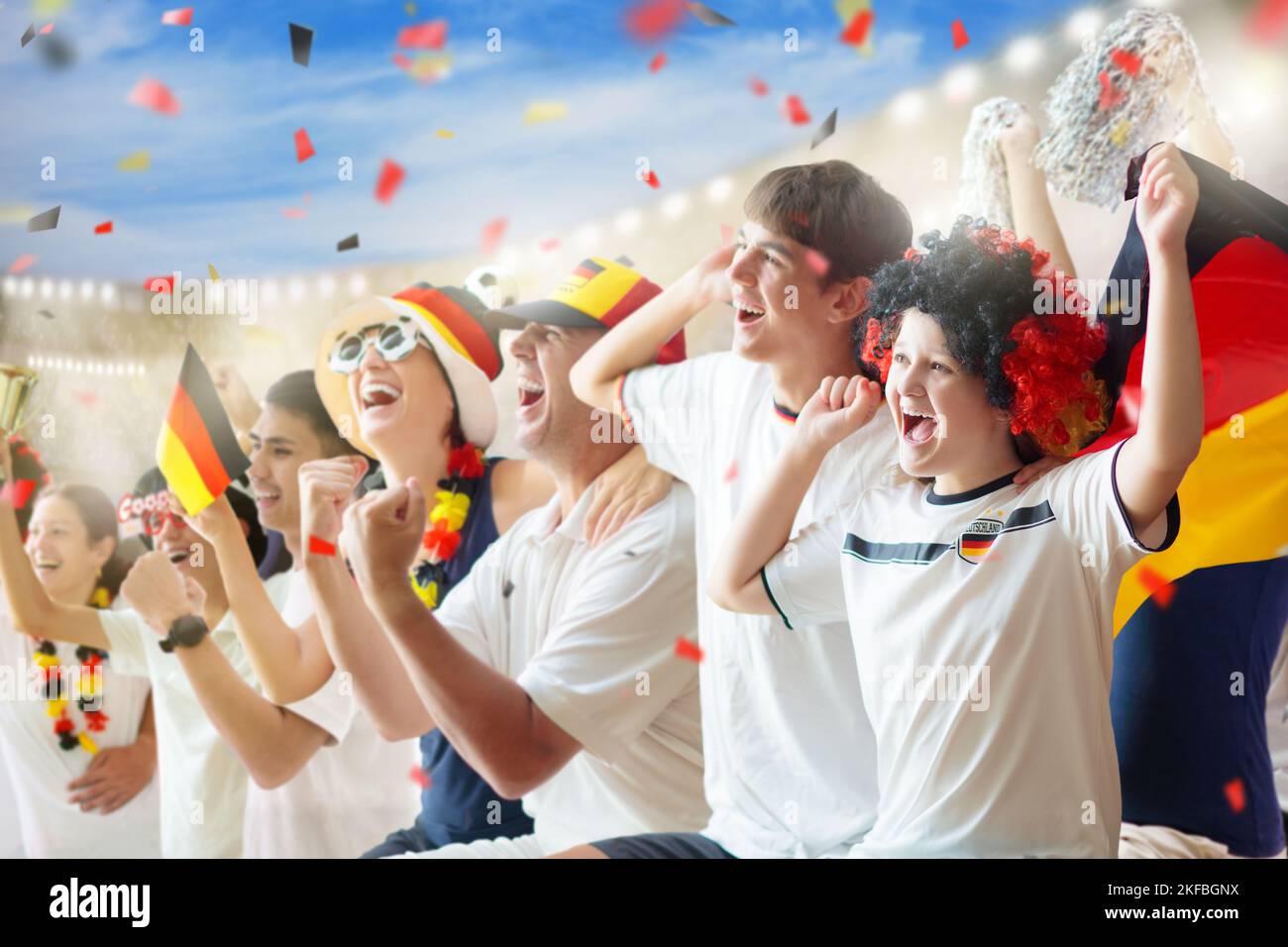 Germany football supporter on stadium. German fans on soccer pitch ...
