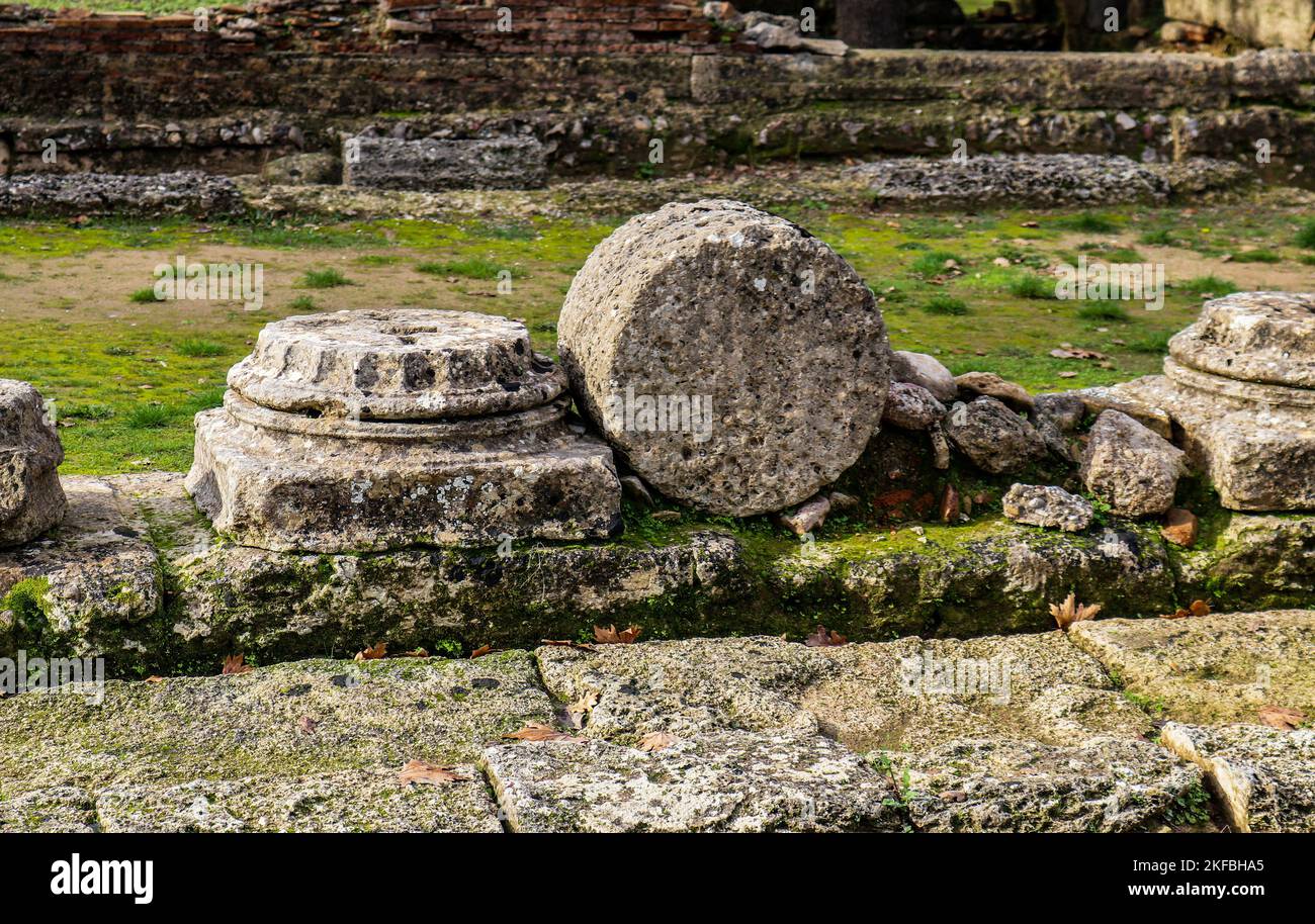 Fallen pillars in the ruins of Olympia Greece with ancient paving ...