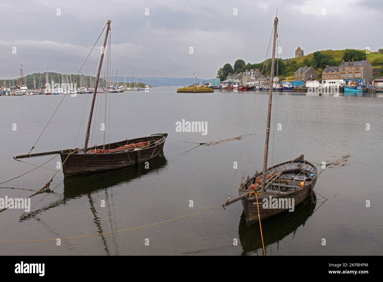 Two Old Wooden Sailing Boats tied up in East Loch Tarbert, Tarbert ...