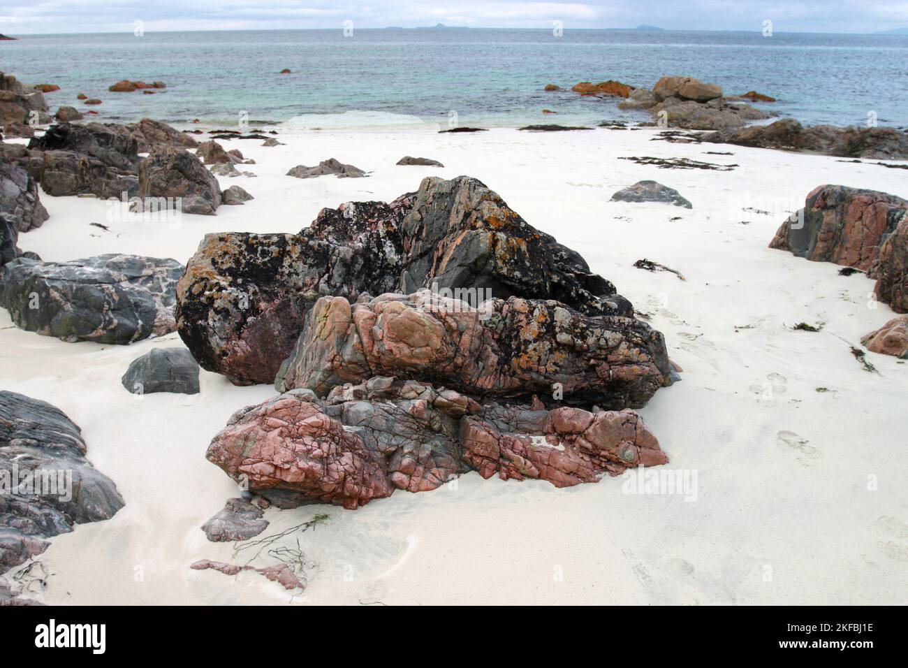 White Sandy Traigh an t-Suidhe Beach with Colourful Rocks, Iona ...