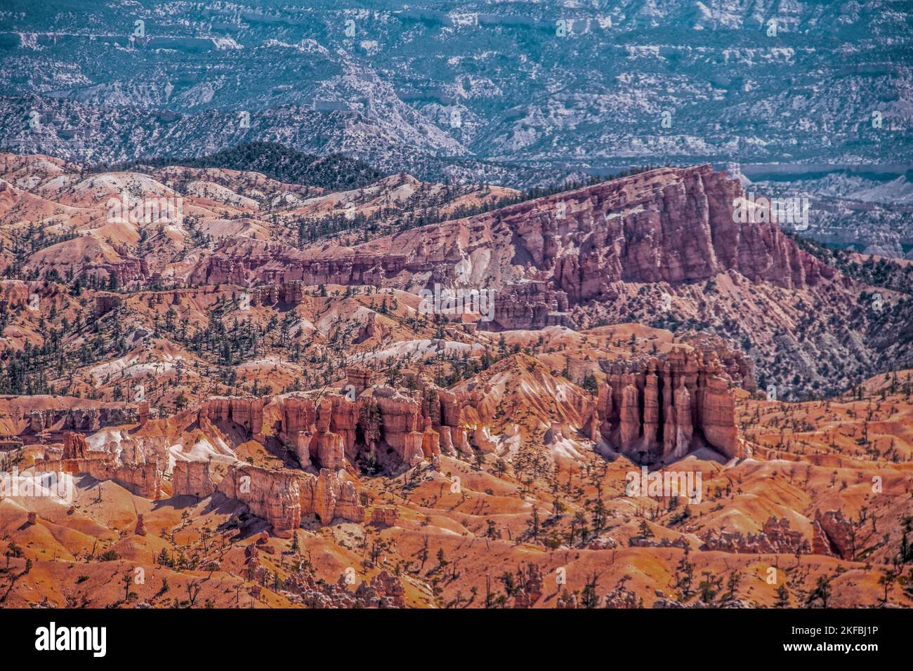 Looking out over the sand dunes and hoodoos of Bryce Canyon into the ...