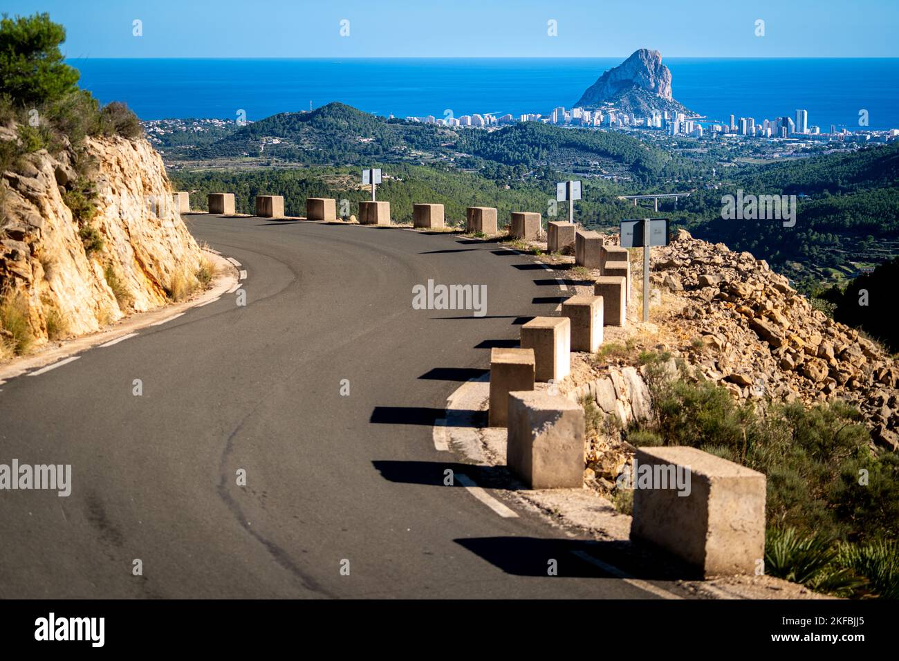 Old spanish mediterranean road with view of Calpe in the background ...
