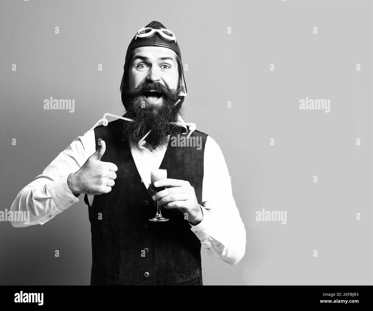 Handsome man showing red Black and White Stock Photos & Images - Alamy